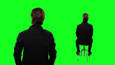 Man Sitting Alone On Green Screen Shot F... | Stock Video | Pond5