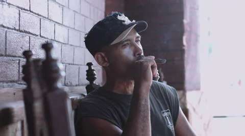 Man Smoking Cigar Stock Video Footage | Royalty Free Man Smoking Cigar Videos | Pond5