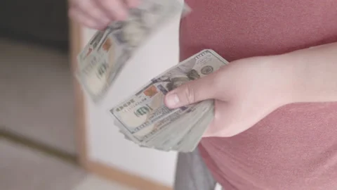 Man sorting $100 USD dollar bills in 4k | Stock Video | Pond5