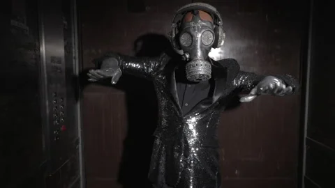 man with sparkling gas mask dancing in a... | Stock Video | Pond5