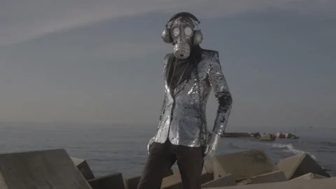 man with sparkling gas mask dancing by t... | Stock Video | Pond5