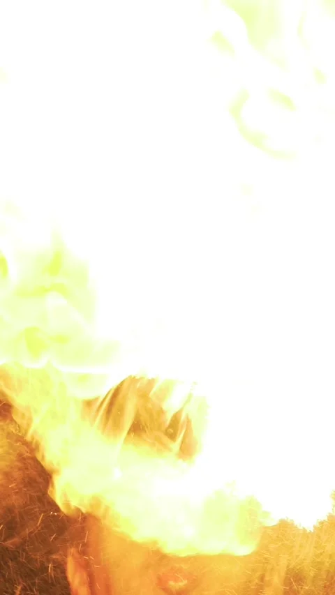 Man is spitting fire cloud close to came... | Stock Video | Pond5