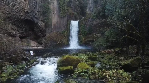 Man Standing Cheering By Huge Waterfall ... | Stock Video | Pond5