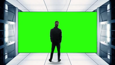 Person Standing Watching Green Screen Stock Footage ~ Royalty Free ...