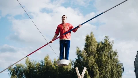 A man stands with his feet in the pelvis... | Stock Video | Pond5
