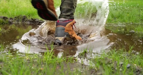Boot Puddle Mud Stock Video Footage | Royalty Free Boot Puddle Mud ...
