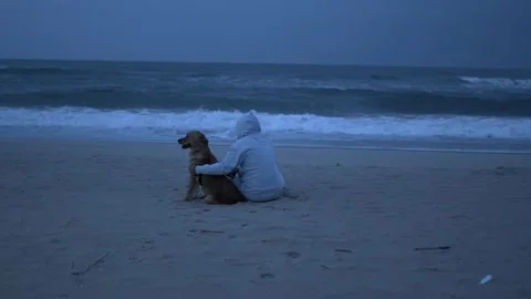 A man suffering from boredom with his do... | Stock Video | Pond5