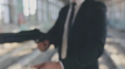 Man Suit Weapon Stock Videos – Royalty-Free HD & 4K Videos | Page 5