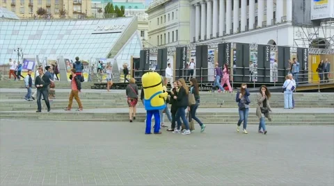 man in suit minion stick to the girl on ... | Stock Video | Pond5