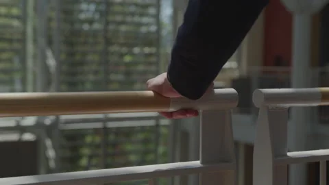 Man In Suit Rests Hand On Railing | Stock Video | Pond5