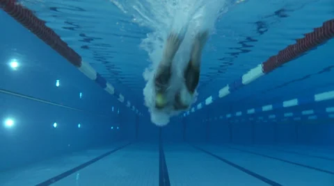 man swimmer jumping in the swimming pool... | Stock Video | Pond5