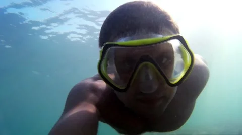 Man Diving Underwater Stock Footage ~ Royalty Free Stock Videos | Pond5