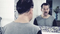 Person Talking In Mirror