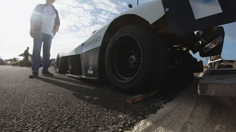 Man Talking To A Racer Sitting On His Ra... | Stock Video | Pond5