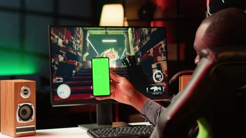 Man texting friends on green screen phon... | Stock Video | Pond5