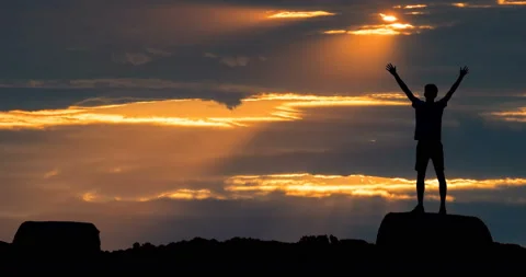 Man On Top Of Hill Success Pose sun rayl... | Stock Video | Pond5