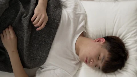 Tossing and Turning Stock Videos – Royalty-Free HD & 4K Videos