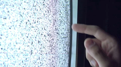 Man Touching TV Screen with Static Noise... | Stock Video | Pond5