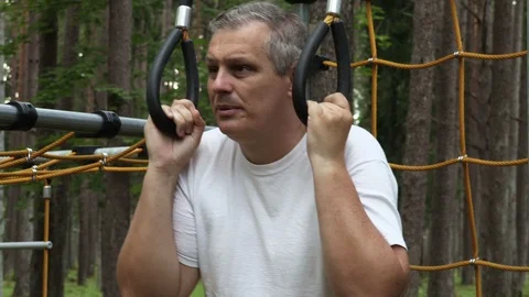 Man try to do exercise | Stock Video | Pond5