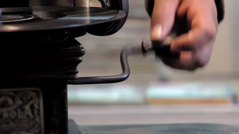 Man Turning the Crank on an Antique Phon... | Stock Video | Pond5