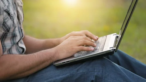 Man Types on Laptop | Stock Video | Pond5