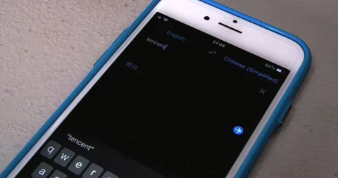 Man types Tencent to translate into Chin... | Stock Video | Pond5