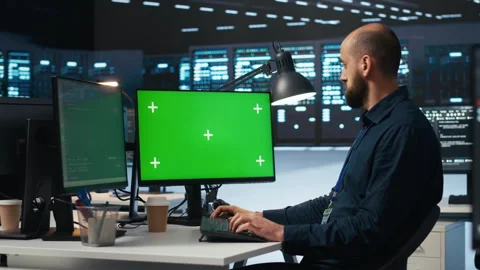 Man typing code on green screen computer... | Stock Video | Pond5