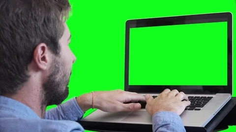 Man Typing On Laptop computer Green Scre... | Stock Video | Pond5