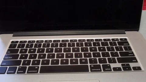 Man Typing the Number 4 Key on Laptop Co... | Stock Video | Pond5