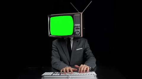 Man typing with TV on head showing green... | Stock Video | Pond5