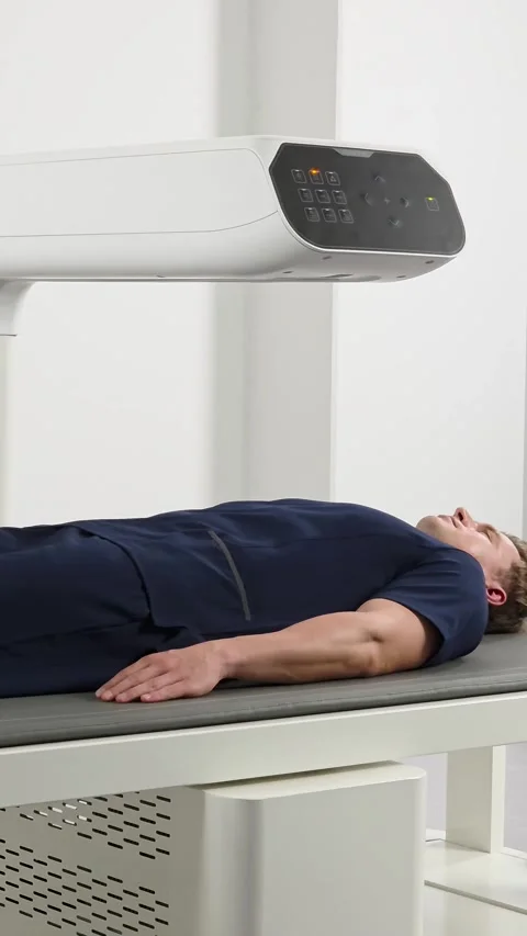 Man undergoing a full body DEXA scan for... | Stock Video | Pond5