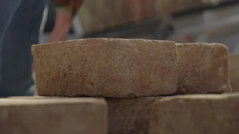 Man unloading bricks from a pickup truck... | Stock Video | Pond5