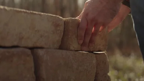 Man unloading bricks from a pickup truck... | Stock Video | Pond5