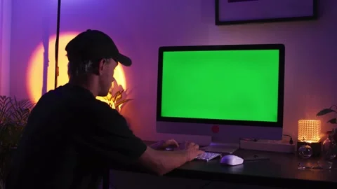 Man using PC computer with green screen ... | Stock Video | Pond5