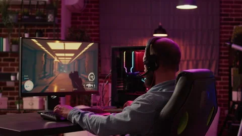Man using pc gaming setup relaxing playi... | Stock Video | Pond5