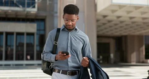 Texting Walking Stock Footage ~ Royalty Free Stock Videos | Pond5