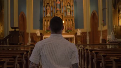 Man Walking Down Center Aisle of Church | Stock Video | Pond5