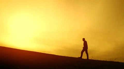 Man Walking Up Hill Mountain Climb Sunse... | Stock Video | Pond5