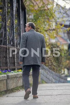 Man walking on the street Stock Image ~ #122223246