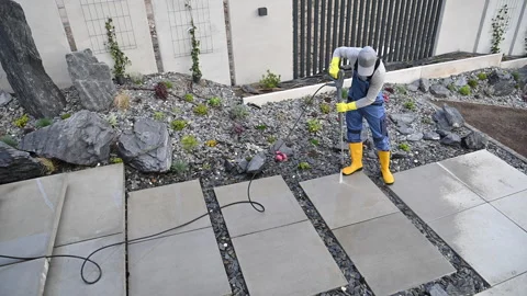 Man Washing Outdoor Tiles with Pressure ... | Stock Video | Pond5