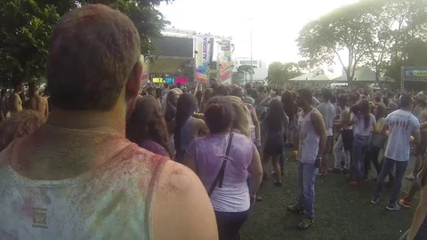 Man Watching Crowd Dancing - Handheld | Stock Video | Pond5