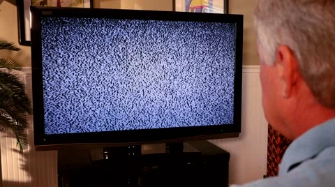 Man Watching Static on TV Close Up 4K | Stock Video | Pond5