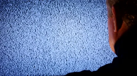 Man Watching Static on TV Extreme Close ... | Stock Video | Pond5