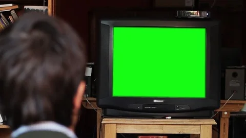 Man watching TV Green Screen in the Livi... | Stock Video | Pond5
