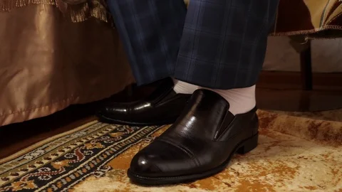 a man in white socks and pants in a cage... | Stock Video | Pond5