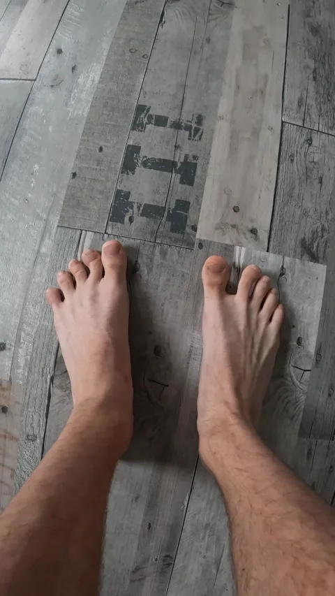 Man wiggling his toes and moving with hi... | Stock Video | Pond5