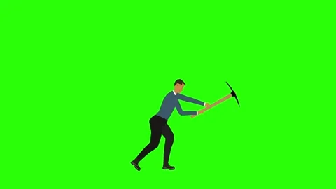 Man working with handle pick tool on gre... | Stock Video | Pond5