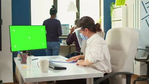Manager with face mask typing on compute... | Stock Video | Pond5