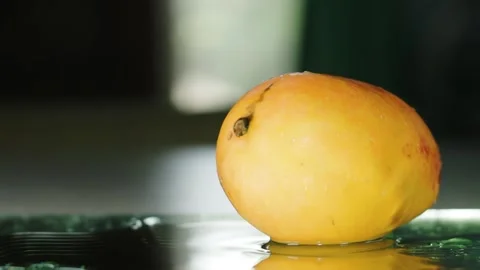 Mango Fruit Falling in Water with Splash... | Stock Video | Pond5