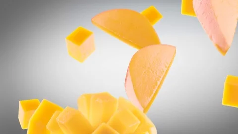 Mango with Slices Falling on Dark Grey B... | Stock Video | Pond5